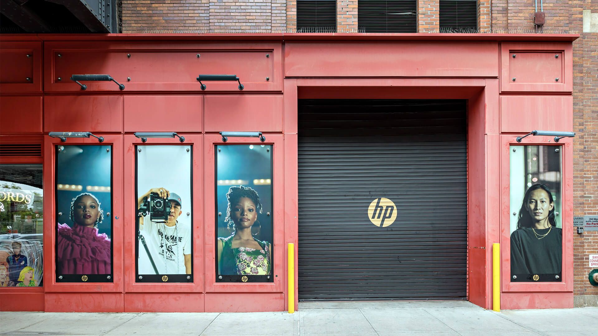 Outside of building for HP launch event in NYC. Posters of artists and ...